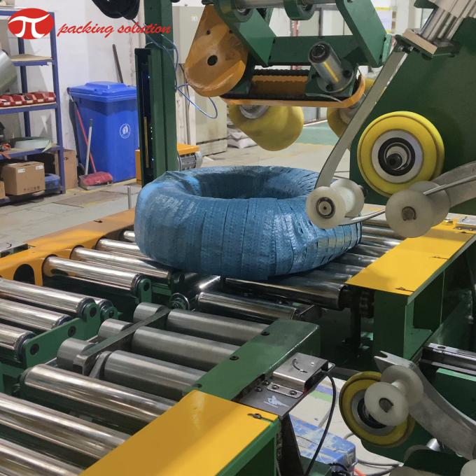 Automatic horizontal hose pipe coil wrapping machine